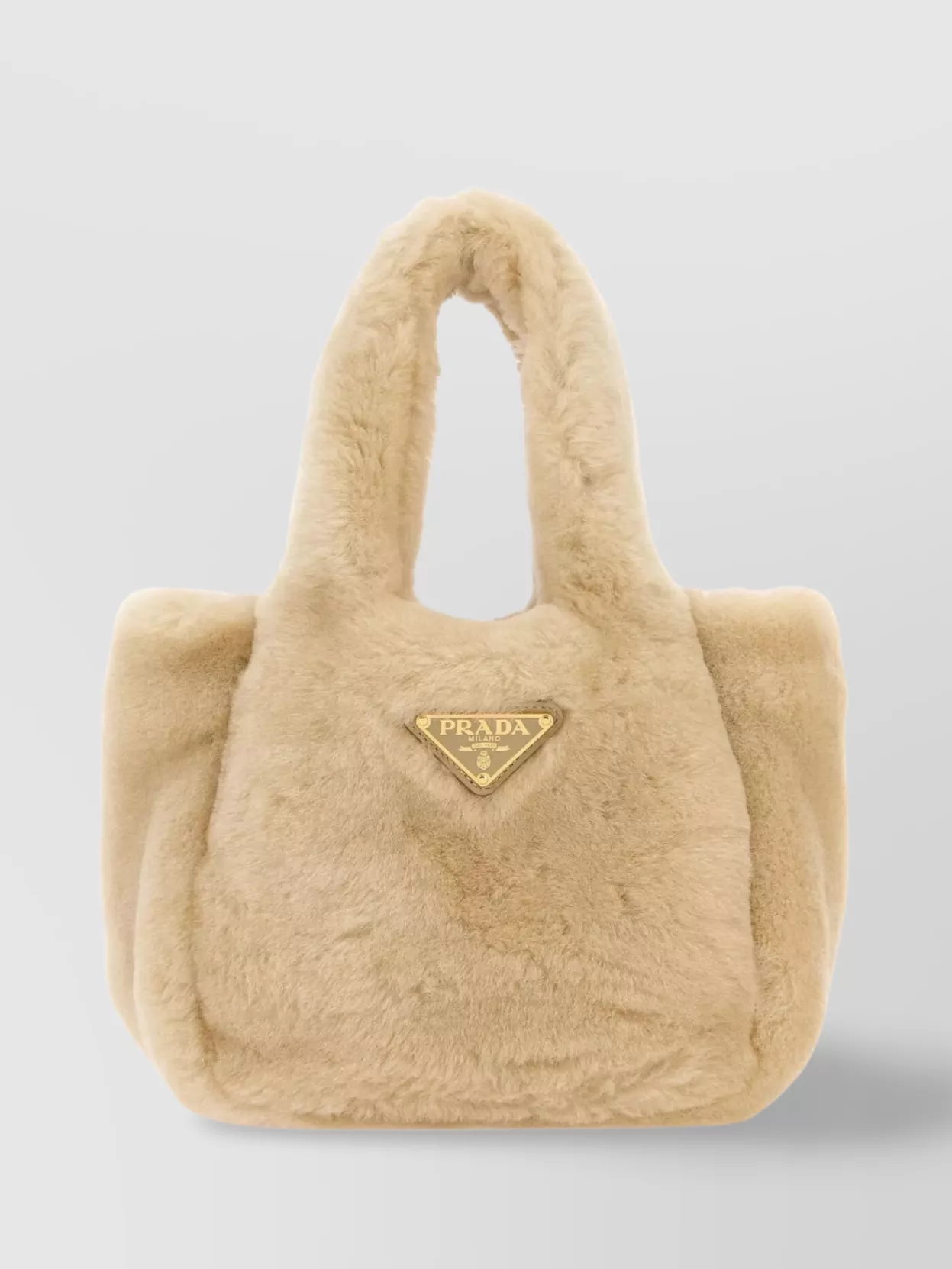 Prada Shearling textured handle bag | The Fashion Square